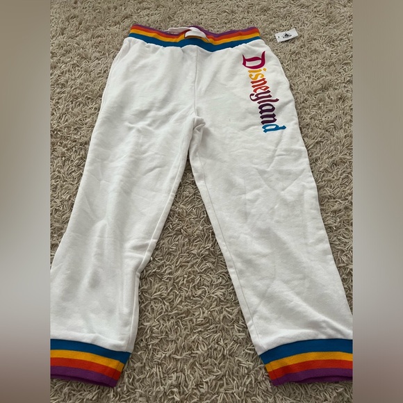 Disney | Pants & Jumpsuits | Disney White And Rainbow Cropped Joggers ...